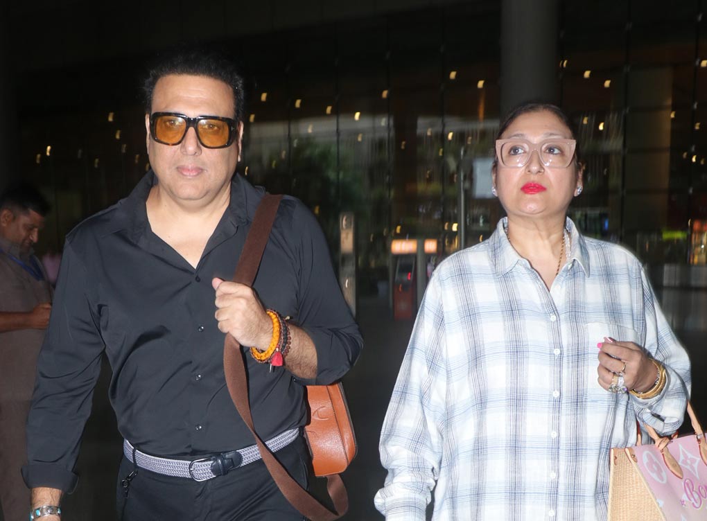 Govinda spotted at the Airport with his wife Sunita Ahuja